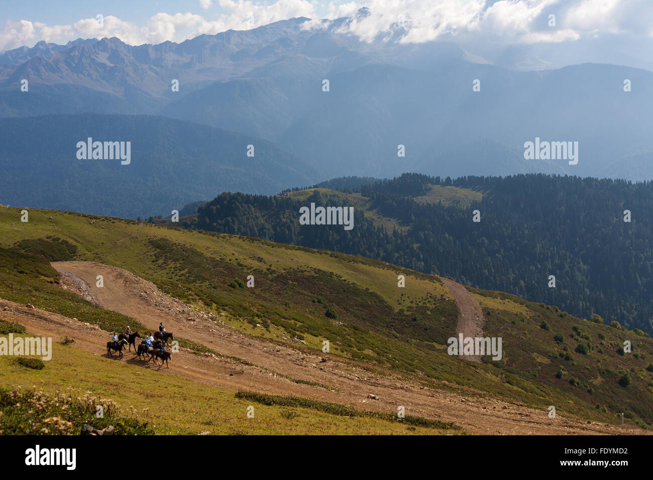 Horseback riding in mountain hi-res stock photography and images - Alamy