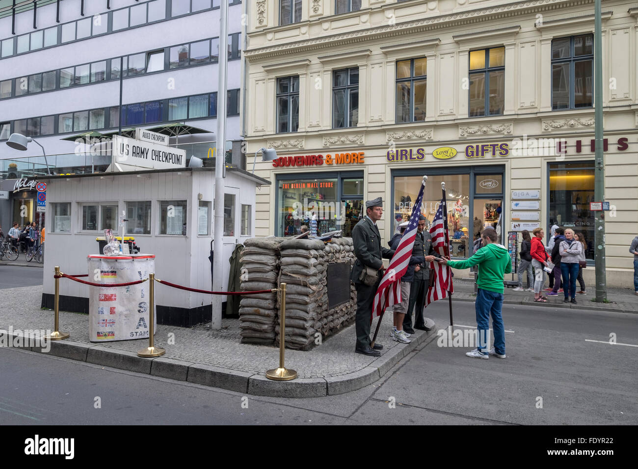 Tourists with costumed American soldiers at 'Checkpoint Charlie ...