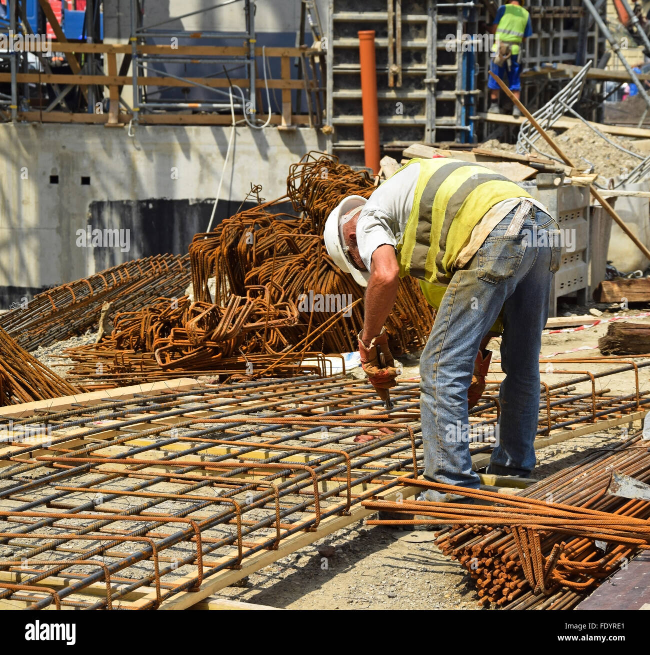 Working at the construction site Stock Photo - Alamy