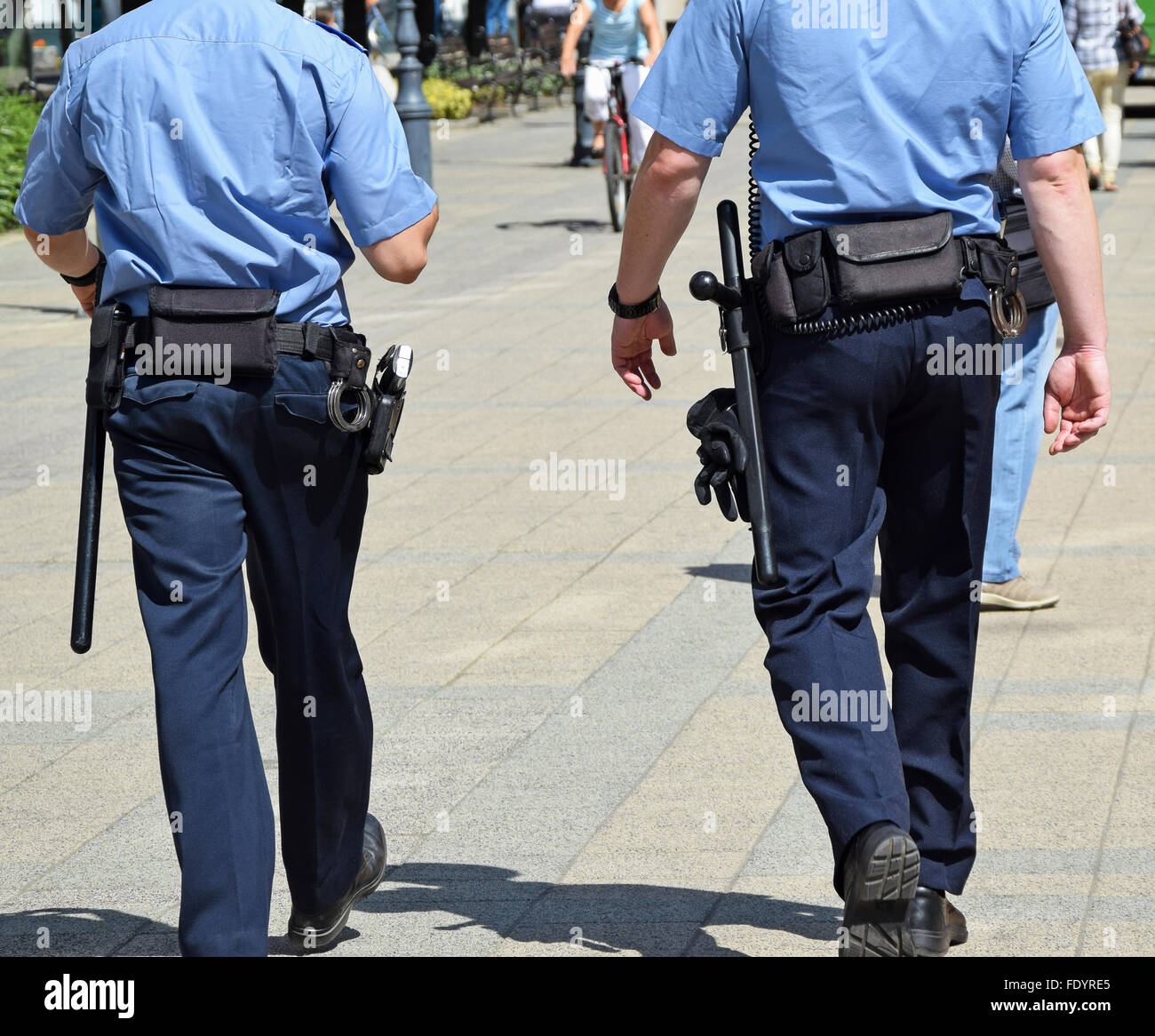 Police officers on the street Stock Photo - Alamy