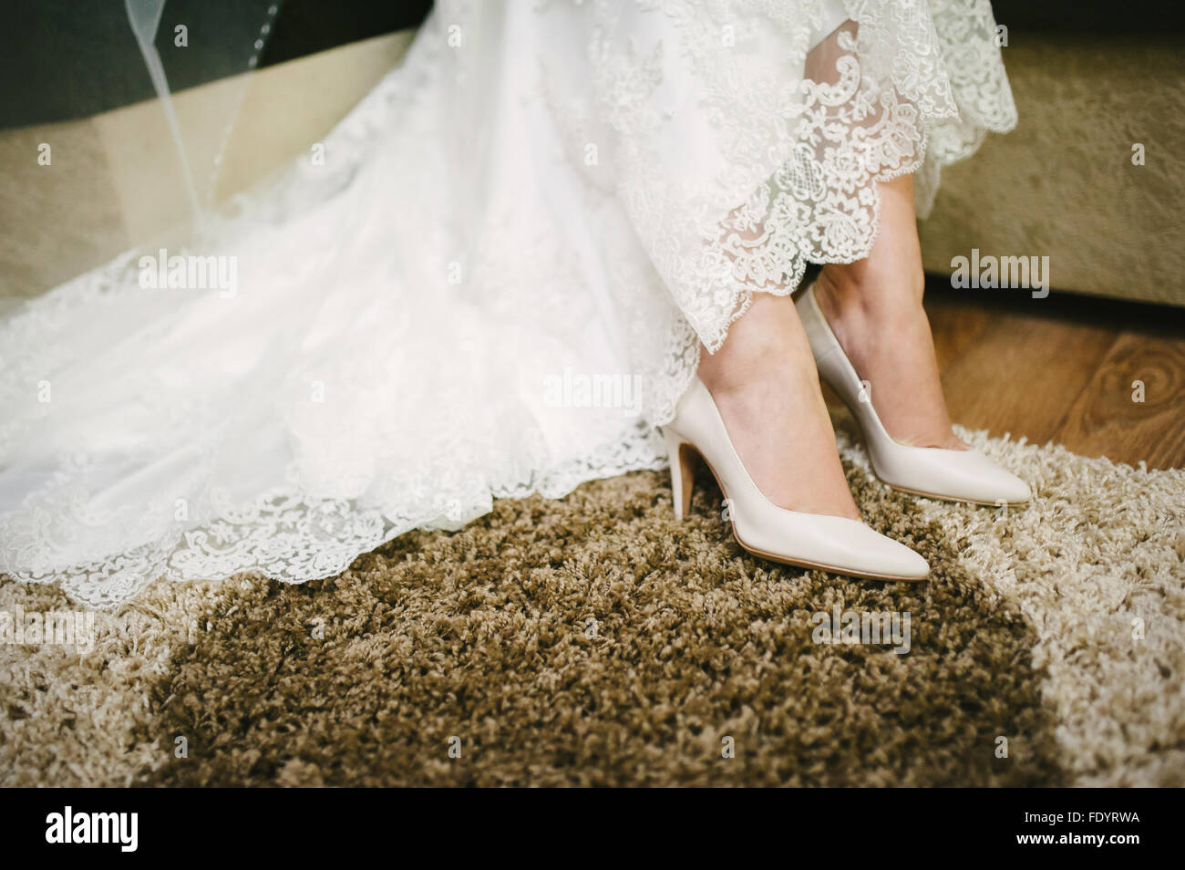 bride getting dressed on her best day ever Stock Photo - Alamy