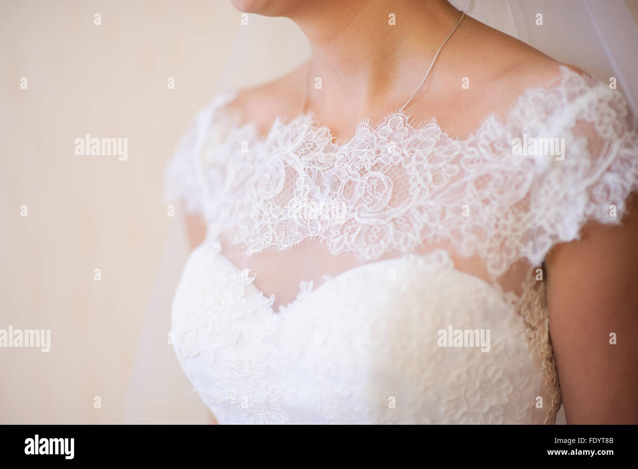 a woman's neck line on her wedding day Stock Photo - Alamy