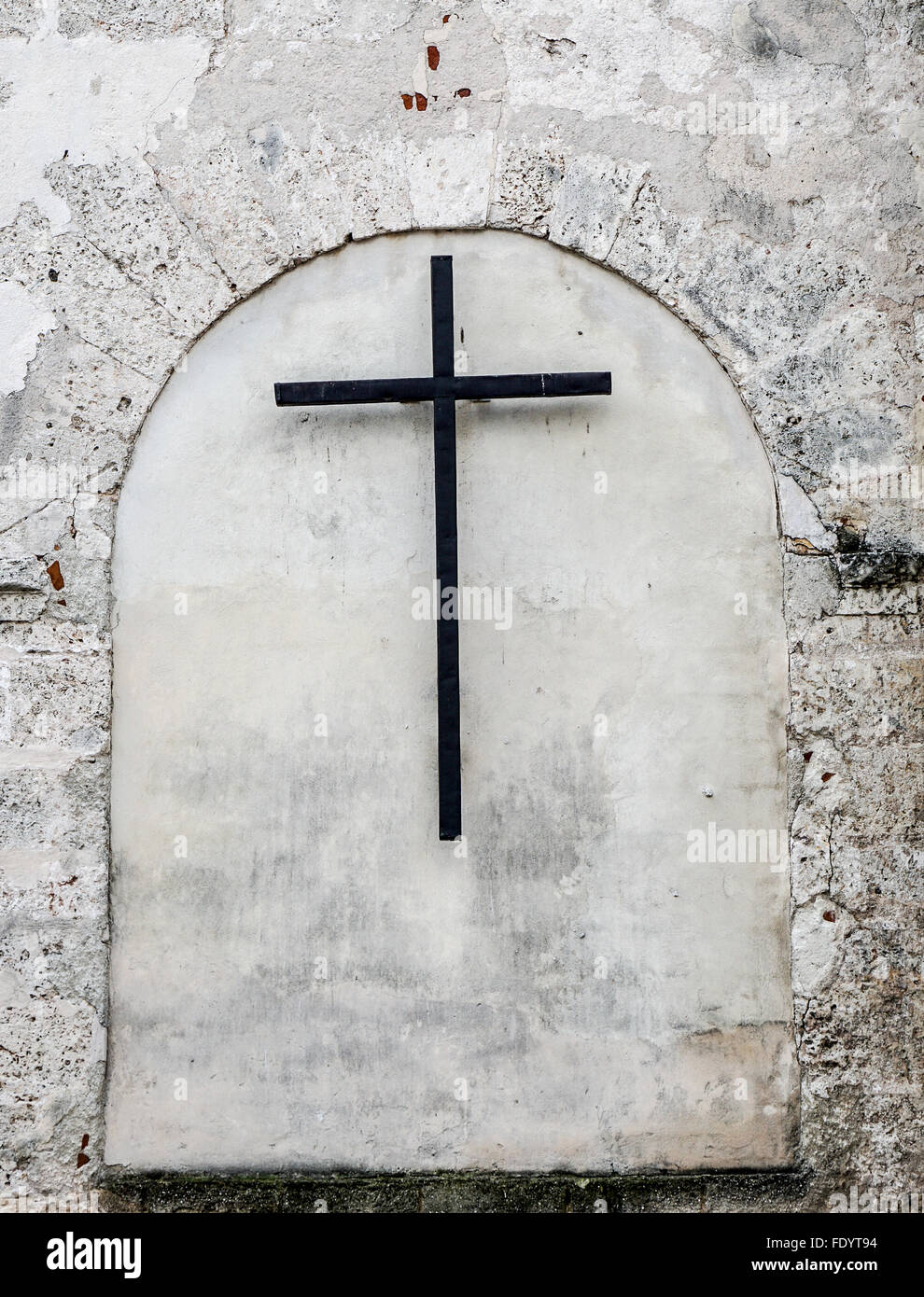 Cross on Wall, simpel sign for Church or religion Stock Photo - Alamy