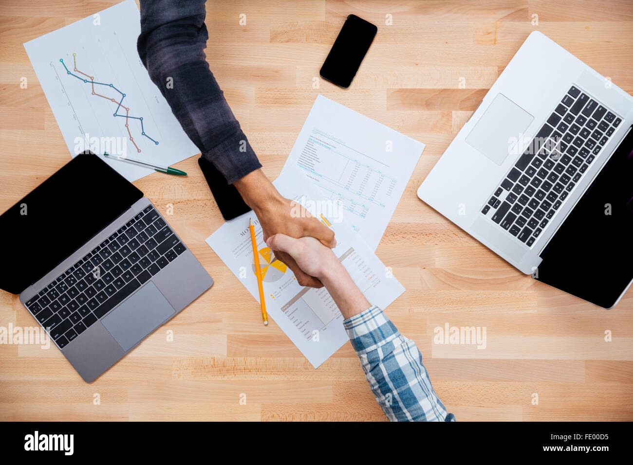 Top view people shake hands hi-res stock photography and images - Alamy