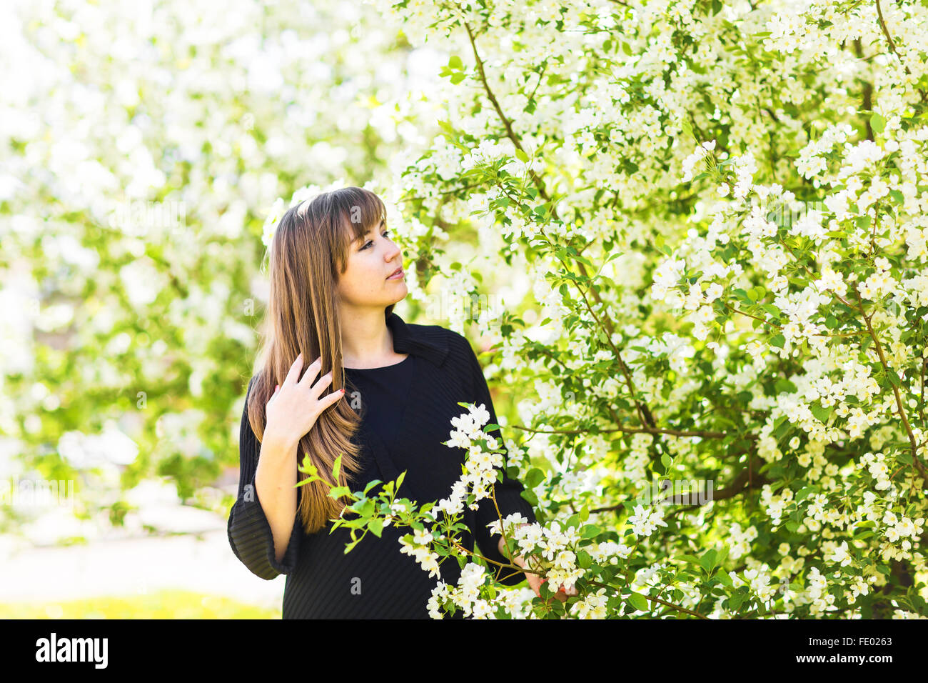 Beautiful Spring Girl with flowers Stock Photo - Alamy