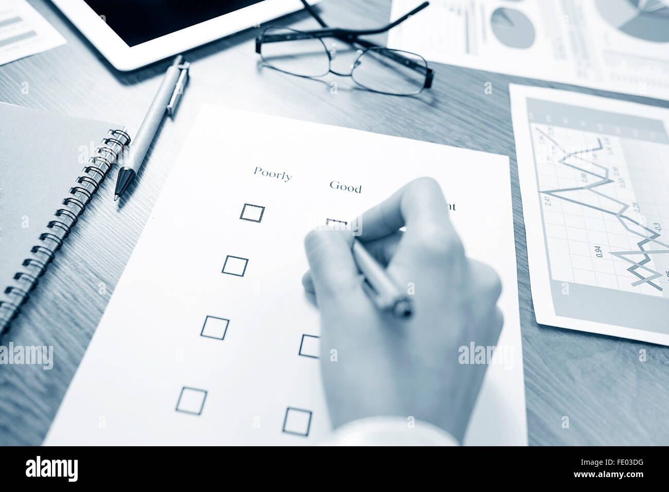 Examination paper on the office desk Stock Photo - Alamy