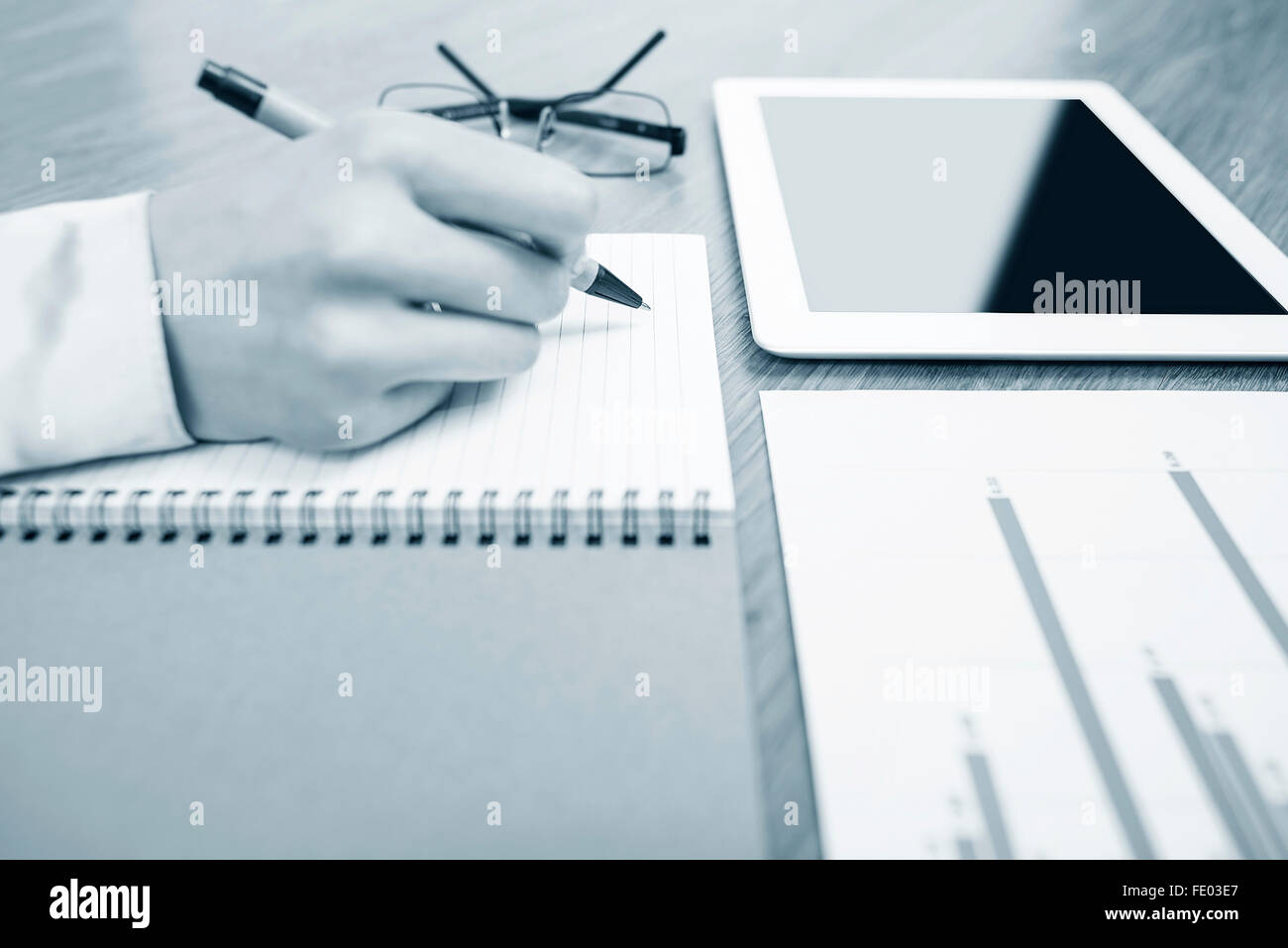 Examination paper on the office desk Stock Photo - Alamy