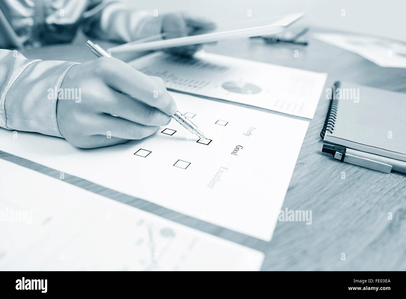 Examination paper on the office desk Stock Photo - Alamy