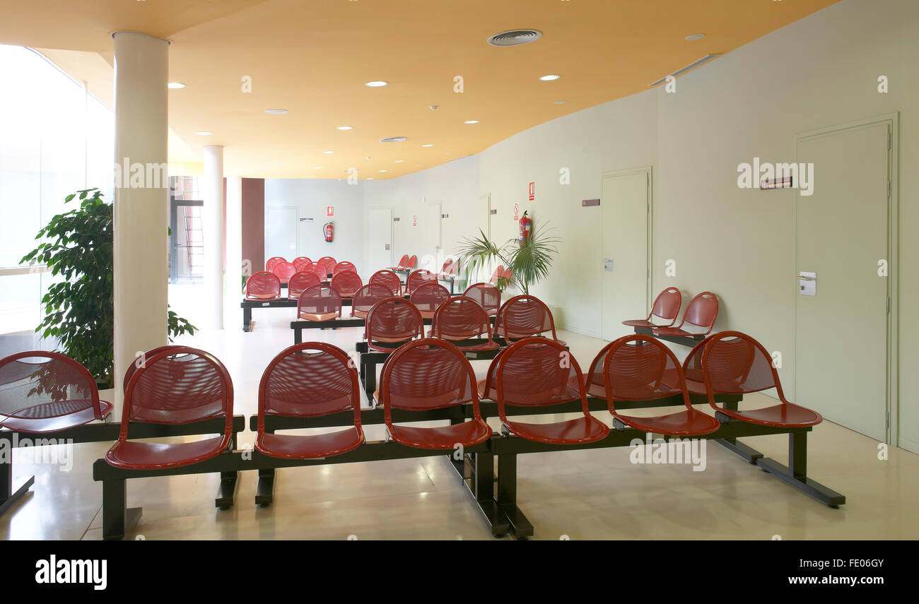 Hospital waiting area with red metallic chairs. Horizontal Stock Photo ...