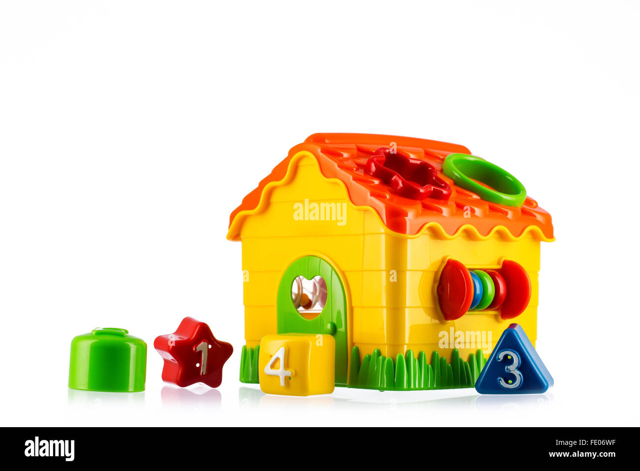 Green toy house on Cut Out Stock Images & Pictures - Alamy