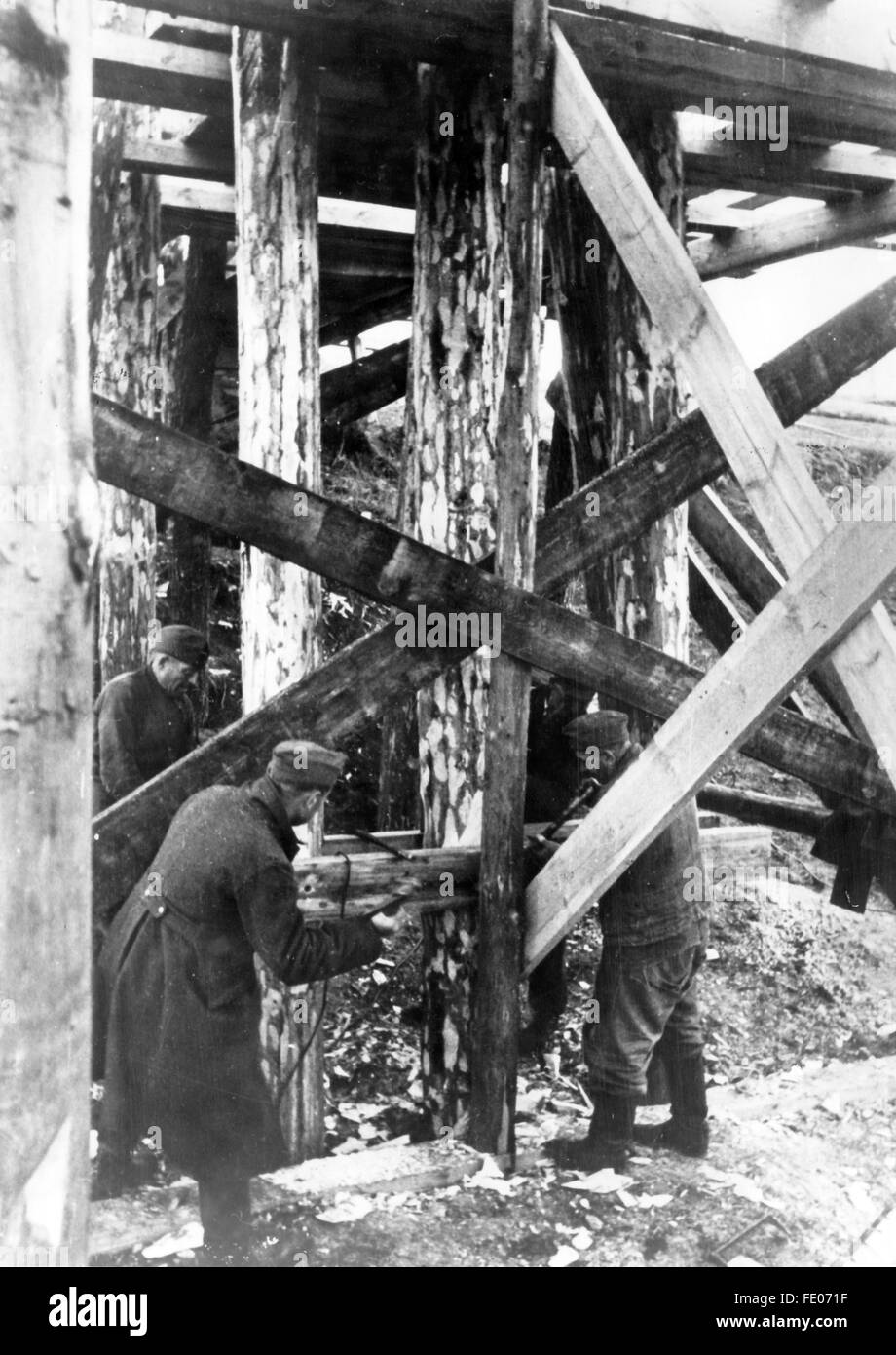 The Nazi propaganda picture shows the construction of a railway bridge ...