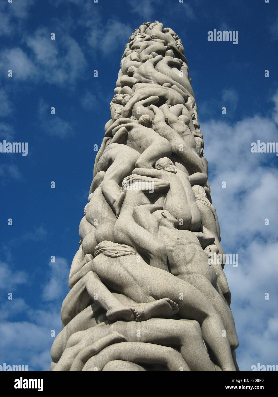 Tower of People, granite sculpture of a tower composed of people ...