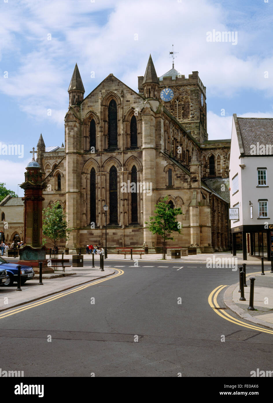 Looking W across Hexham town square to the Augustinian priory church of ...