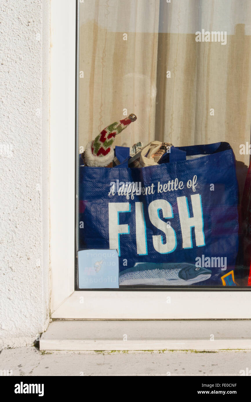 A shopping bag in a window Stock Photo - Alamy