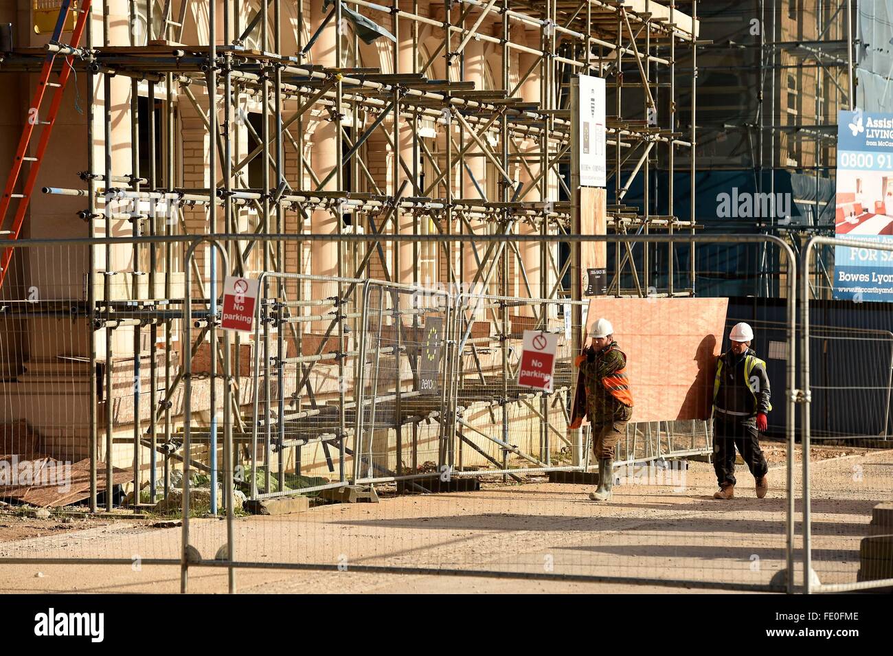 Builders during construction work on Queen Mother Square at the ...