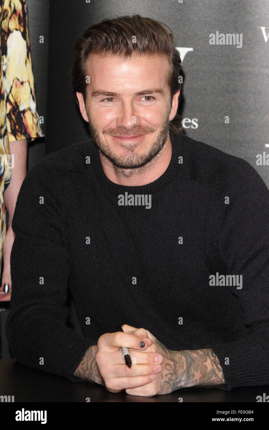 London, UK. 191213. David Beckham meets fans and signs copies of his ...