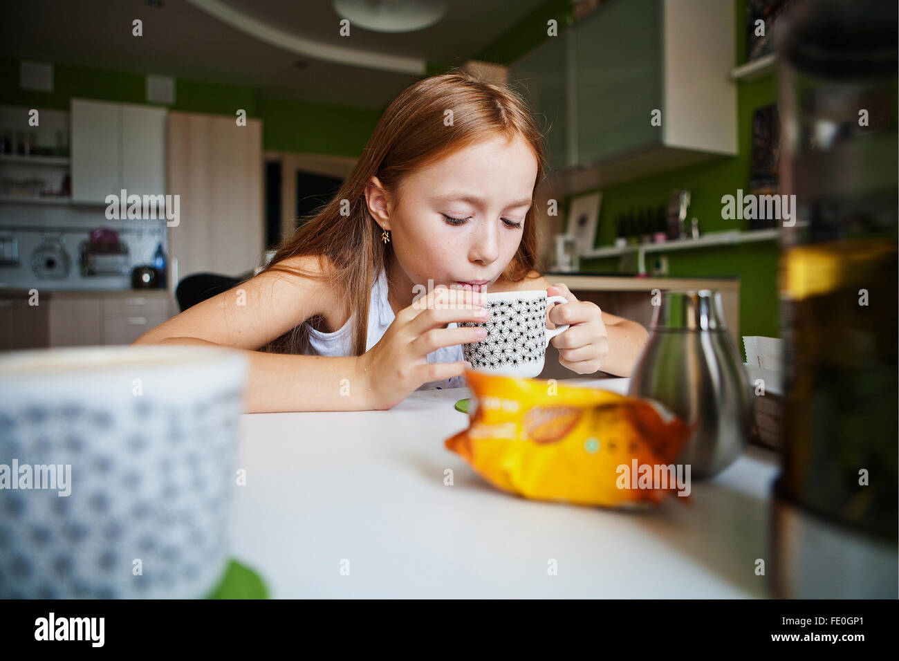 Girl having tea time hi-res stock photography and images - Alamy