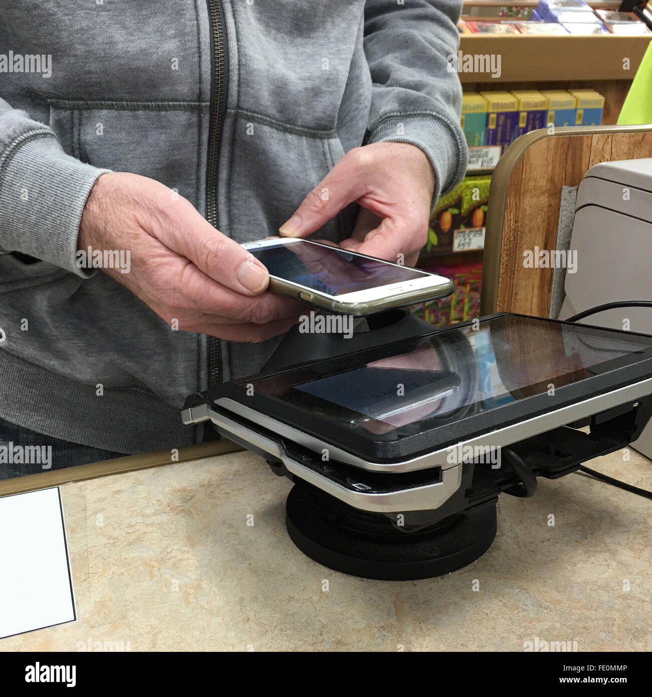 Paying app on phone hi-res stock photography and images - Alamy