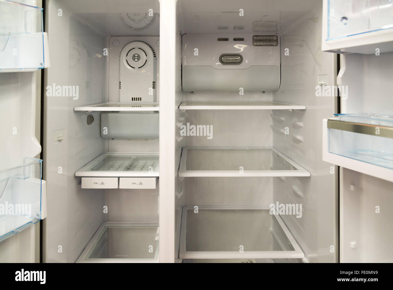 Open home refrigerator with empty shelves Stock Photo - Alamy