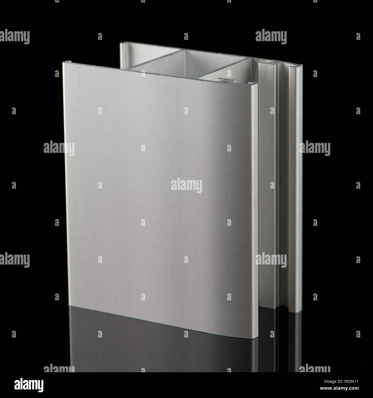 Aluminium profile sample isolated on black background Stock Photo - Alamy