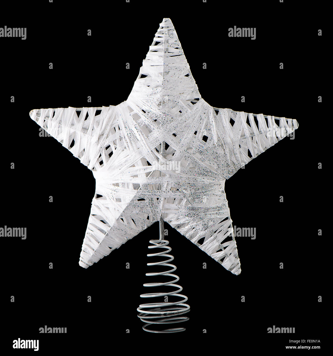 White Christmas star isolated on black background Stock Photo - Alamy