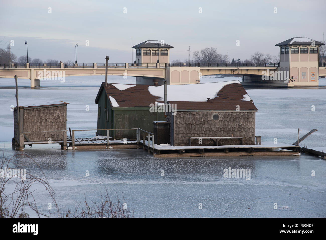 Fishing shack off of the shore of the Fox River in Oshkosh with the ...