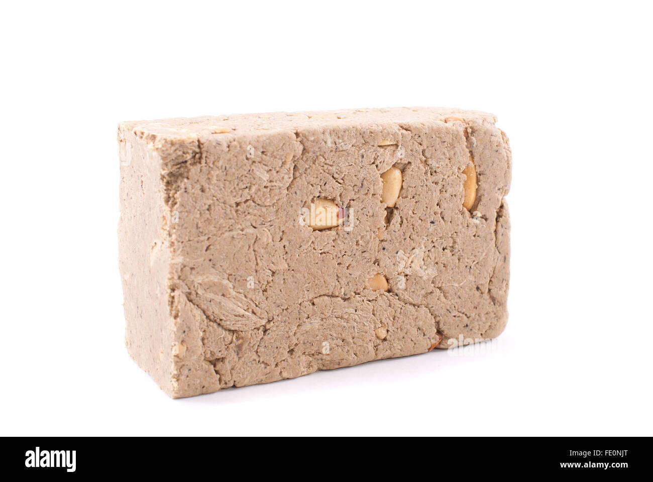 Halva with nuts on a white background Stock Photo - Alamy