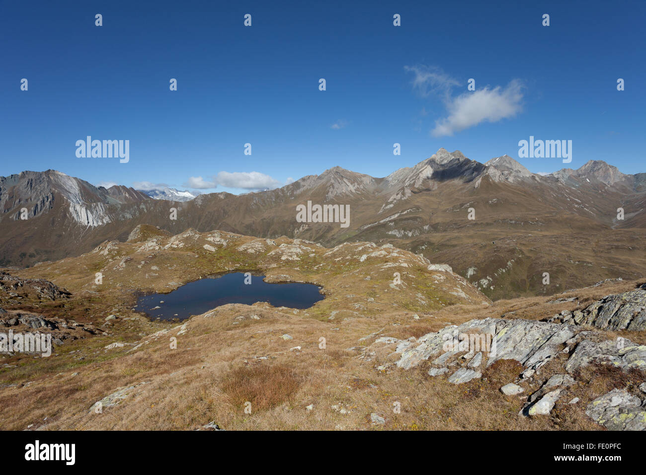 Alpine lake in the Alps at fall Stock Photo - Alamy