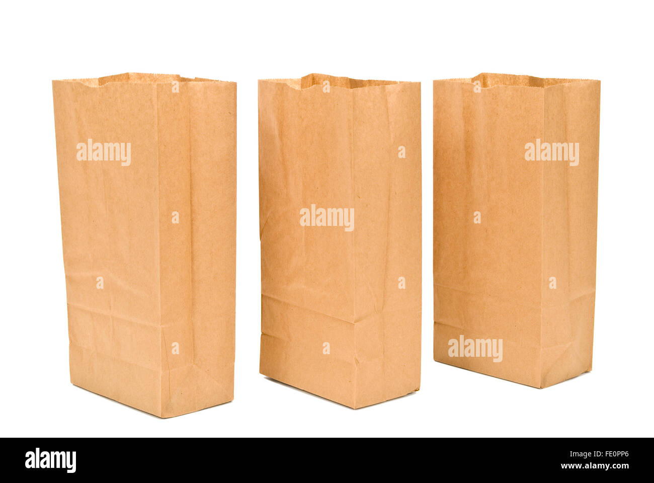 Three Open Brown Paper Sacks With Shadows Stock Photo - Alamy