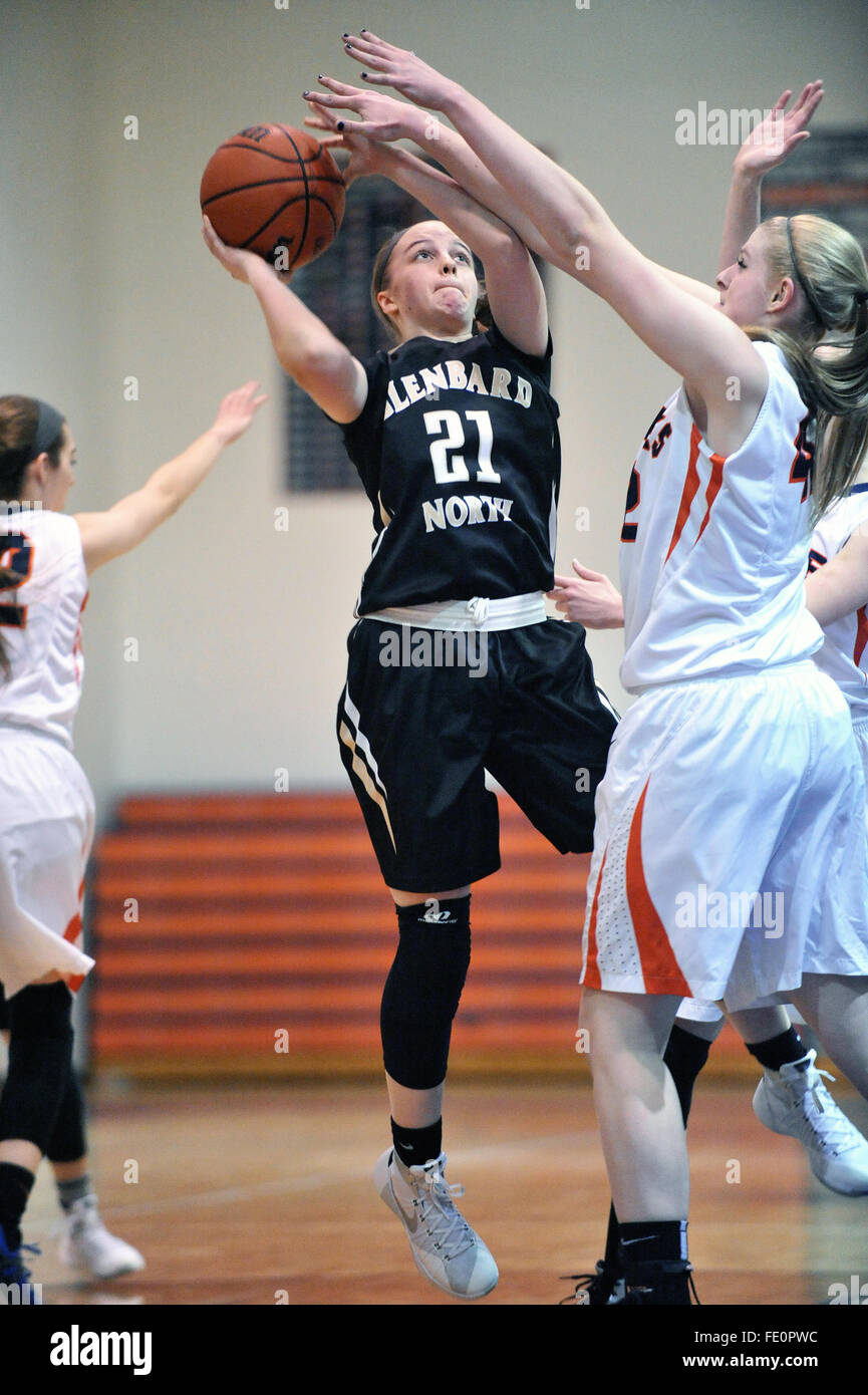 Player draws a group of defending hands as she attempts to get off a ...