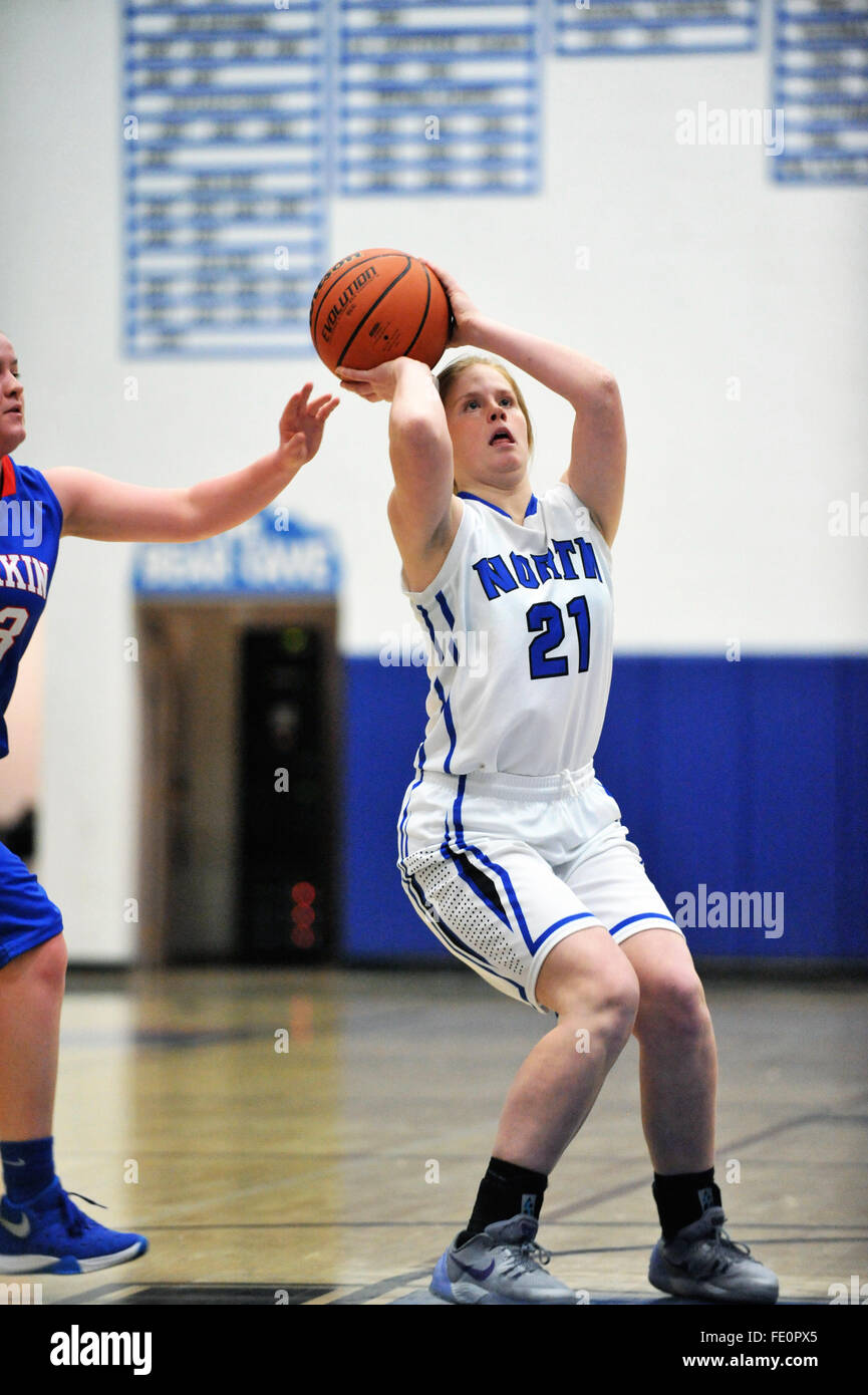 A forward taking a long jump shot prior to being fouled during a high ...