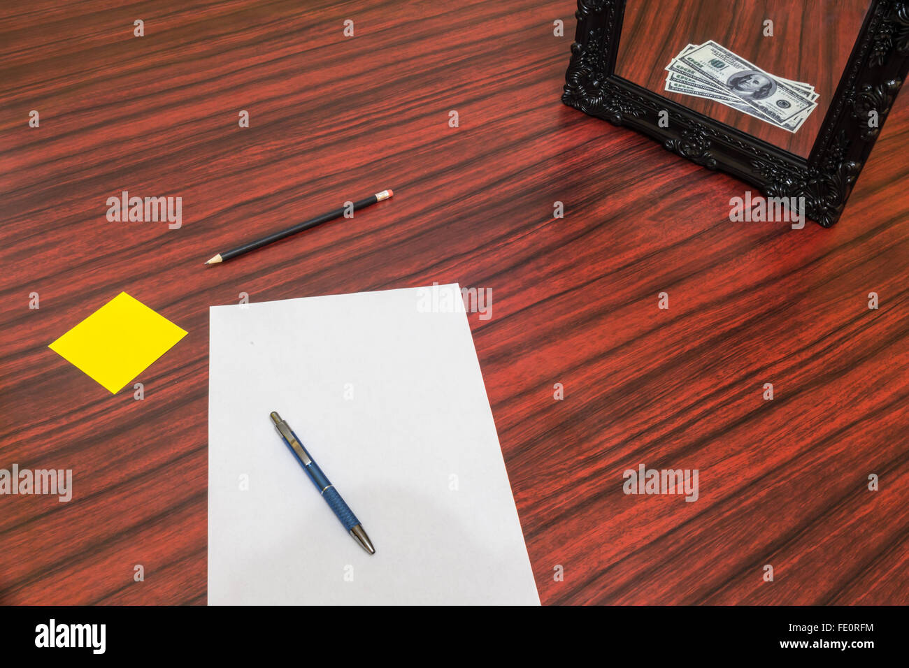 Reflection money in mirror objects hi-res stock photography and images ...