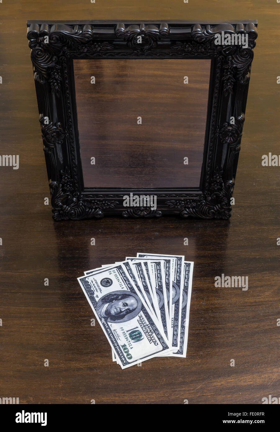 Reflection money in mirror objects hi-res stock photography and images ...