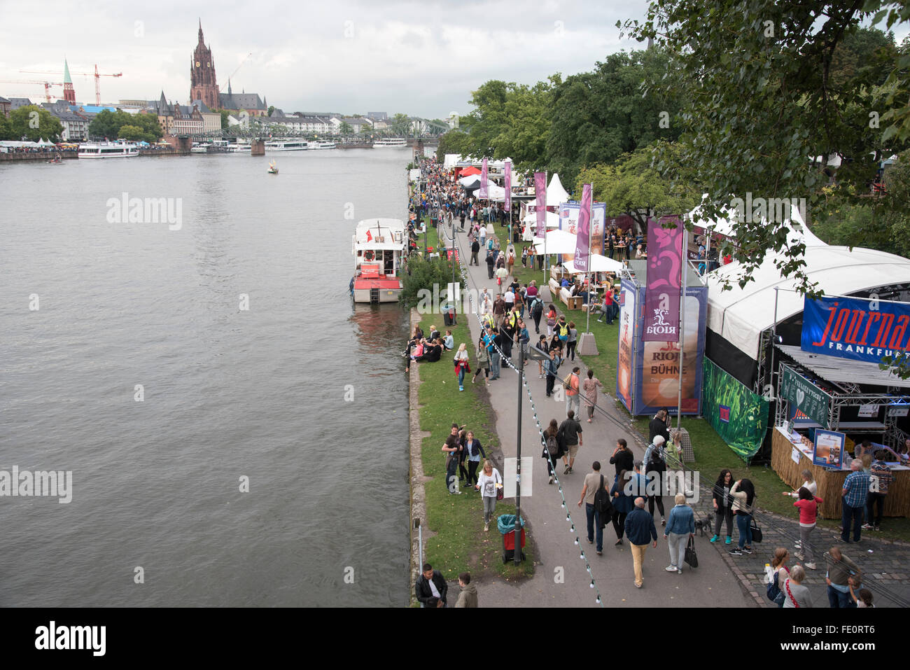 People walking across the Rhine river during the Museum Embankment ...