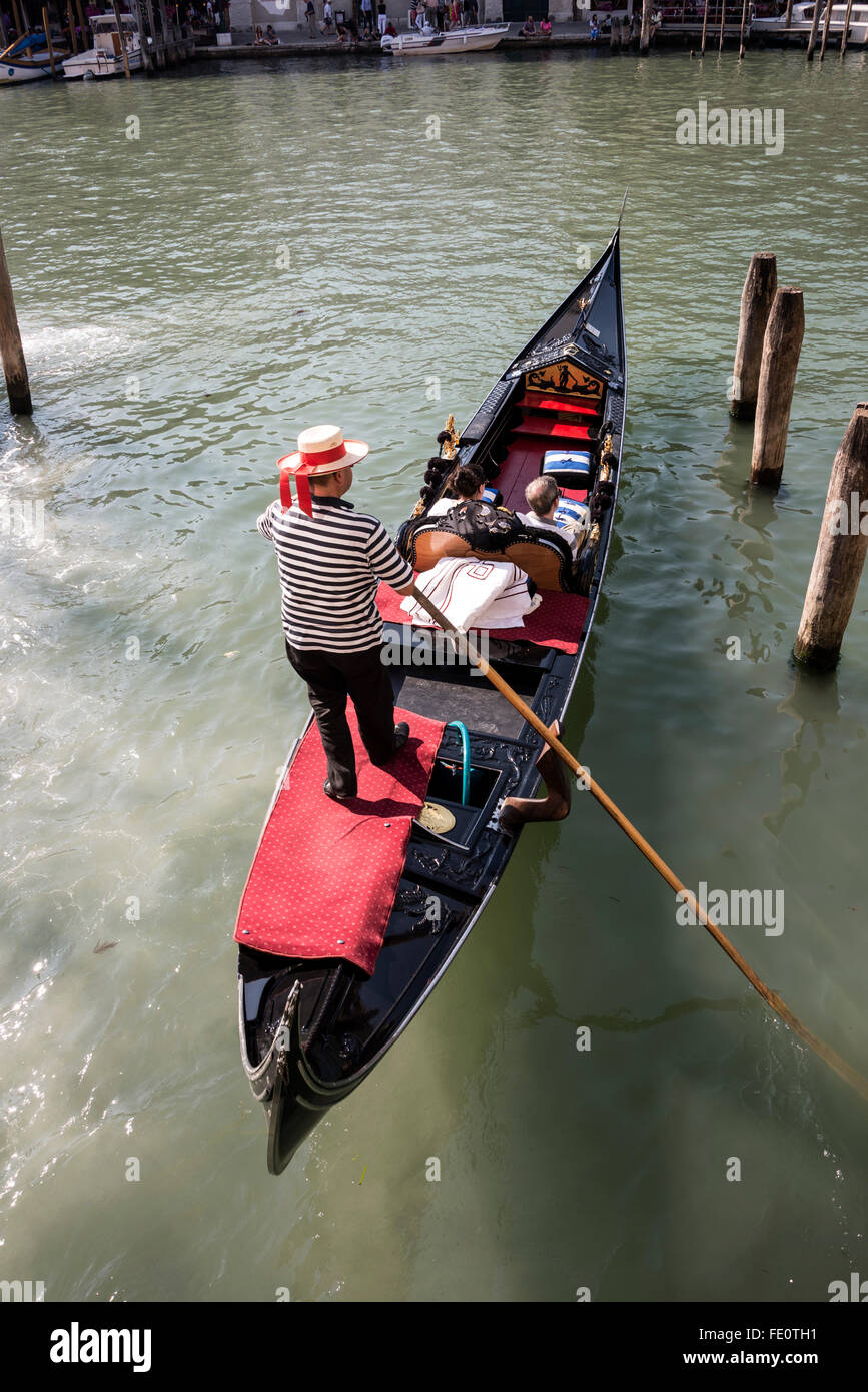 Gondoliere and gondola in canal grande hi-res stock photography and ...