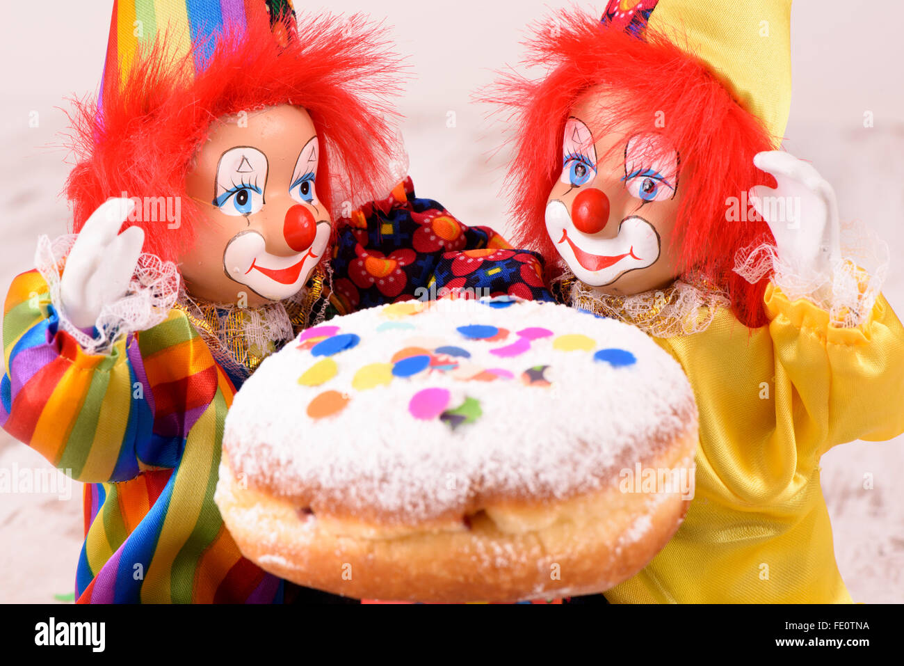 doughnut with clown at carnival Stock Photo - Alamy