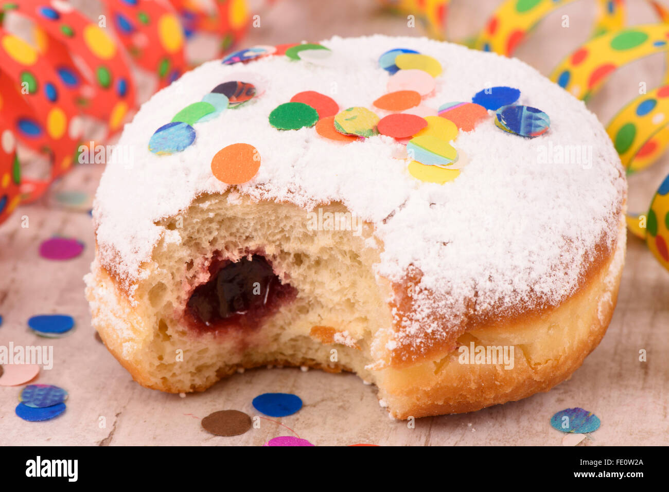 doughnut at carnival with confetti Stock Photo - Alamy
