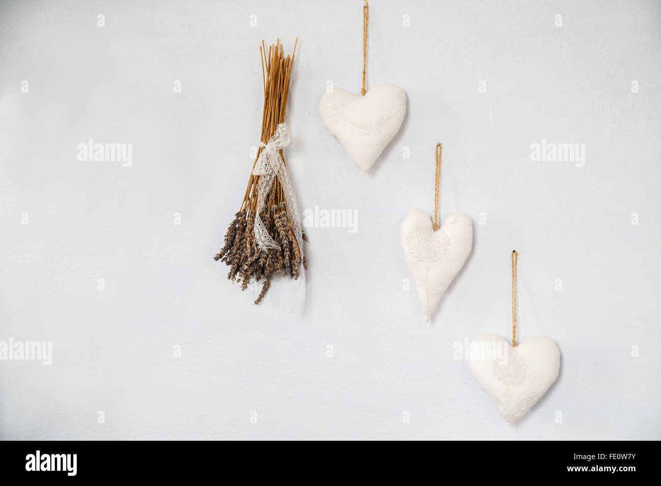 Three white heart valentine paper Stock Photo - Alamy