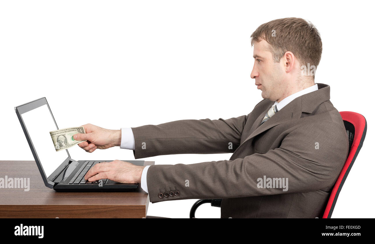 Businessman giving to laptop cash Stock Photo - Alamy