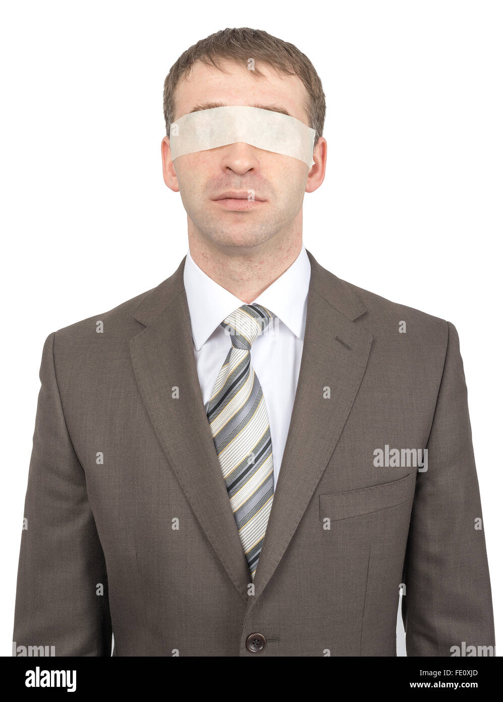 Businessman with tape over his eyes Stock Photo - Alamy