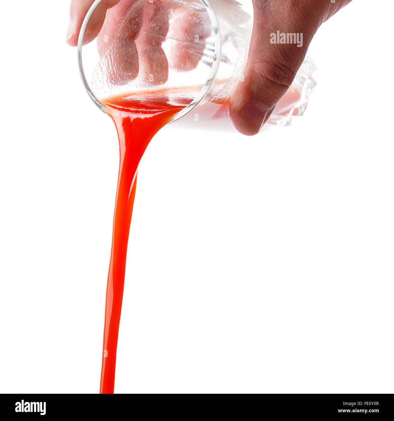 red juice pouring Isolated on white background Stock Photo - Alamy