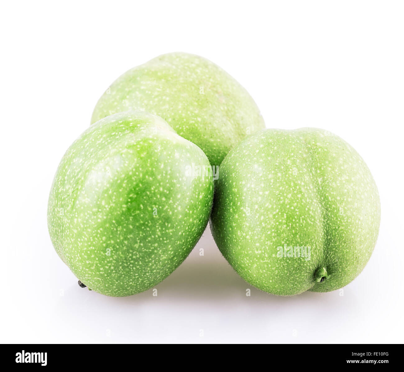 green walnut Isolated on white background Stock Photo - Alamy