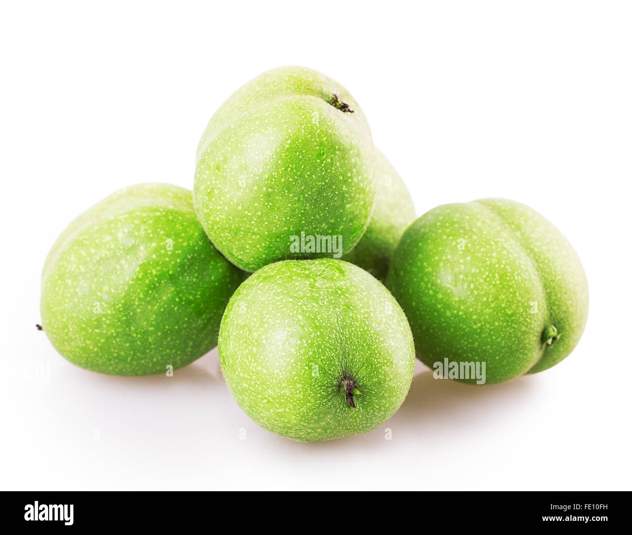 green walnut Isolated on white background Stock Photo - Alamy