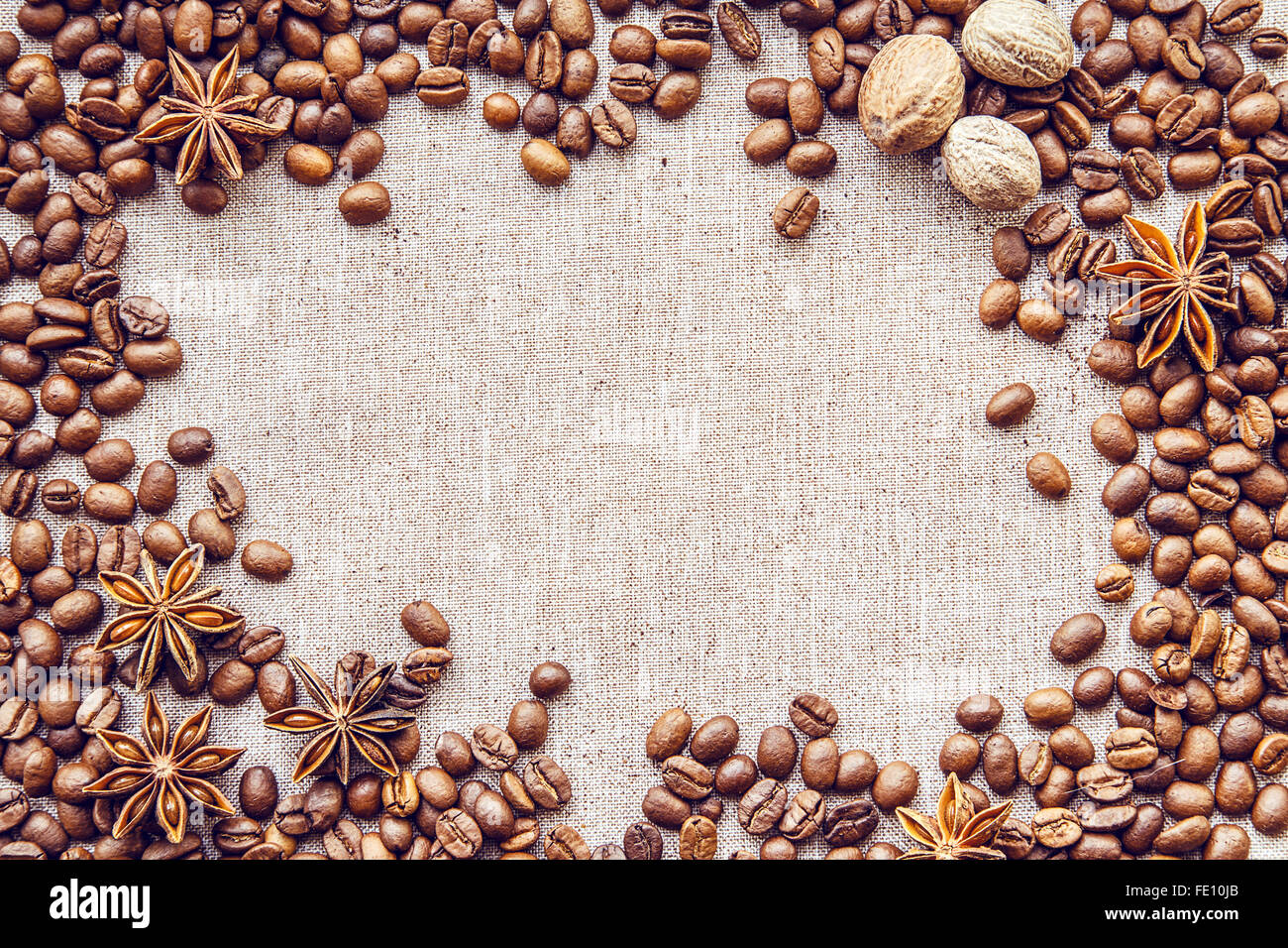 coffee beans on texture canvas Stock Photo - Alamy