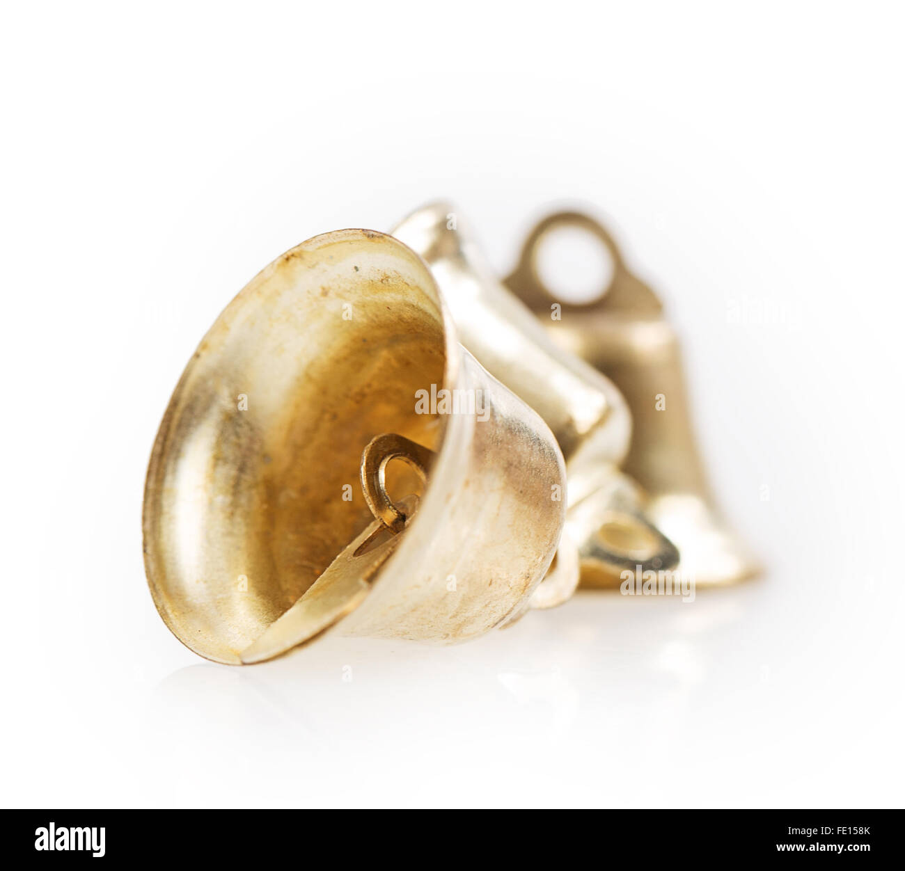 bell isolated white bells gold Stock Photo - Alamy