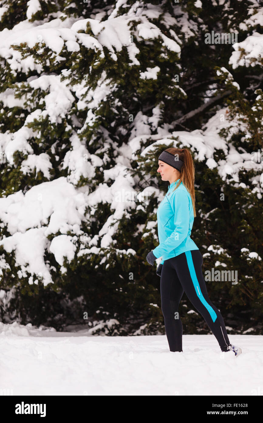 Sports and activities in winter time. Slim fit fitness woman outdoor ...