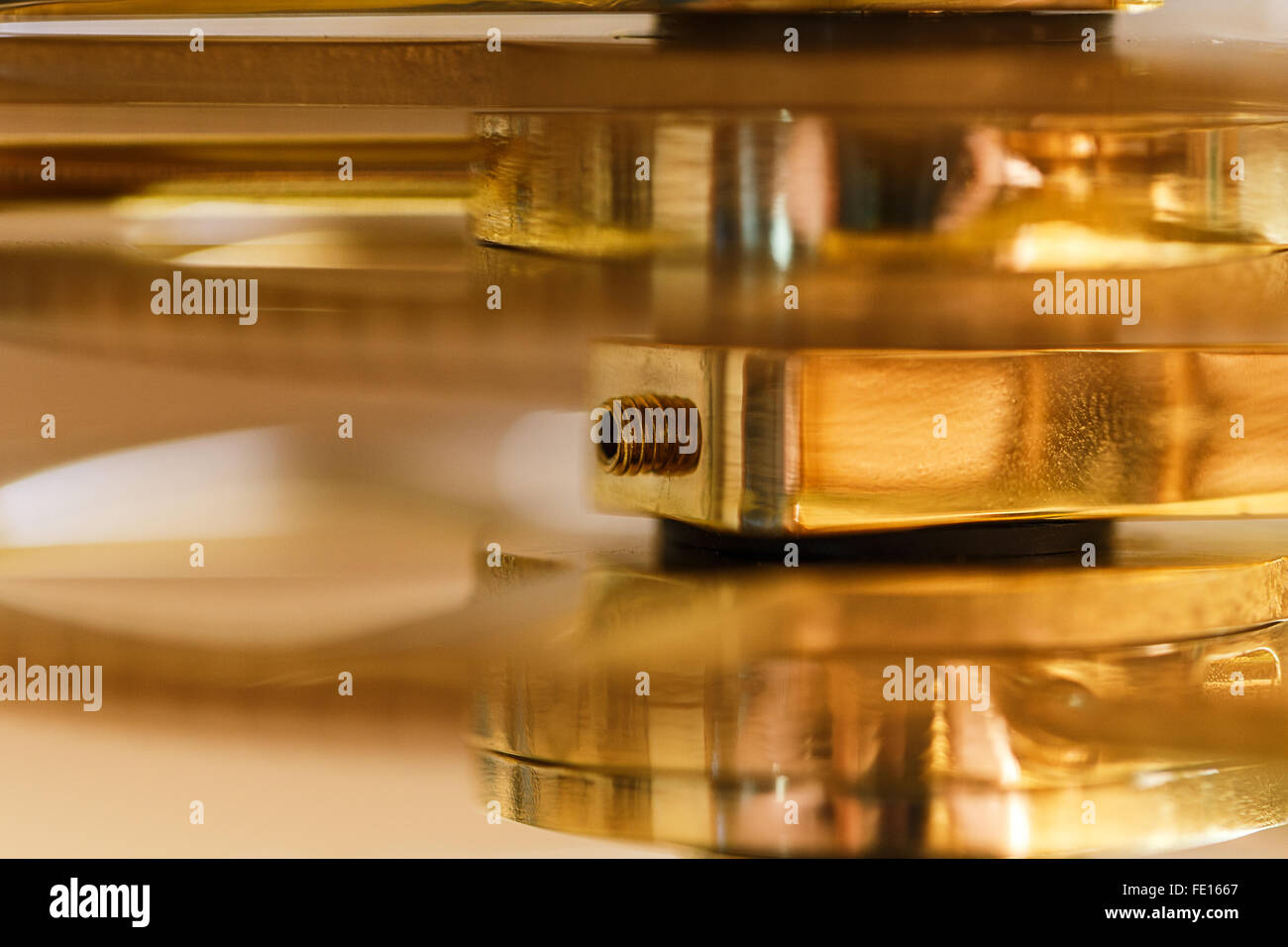 gear mechanism yellow gold color Stock Photo - Alamy