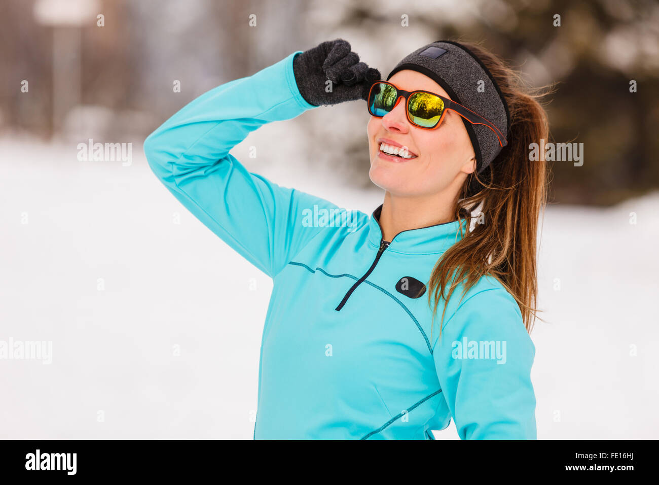 Sports and activities in winter time. Slim fit fitness woman outdoor ...