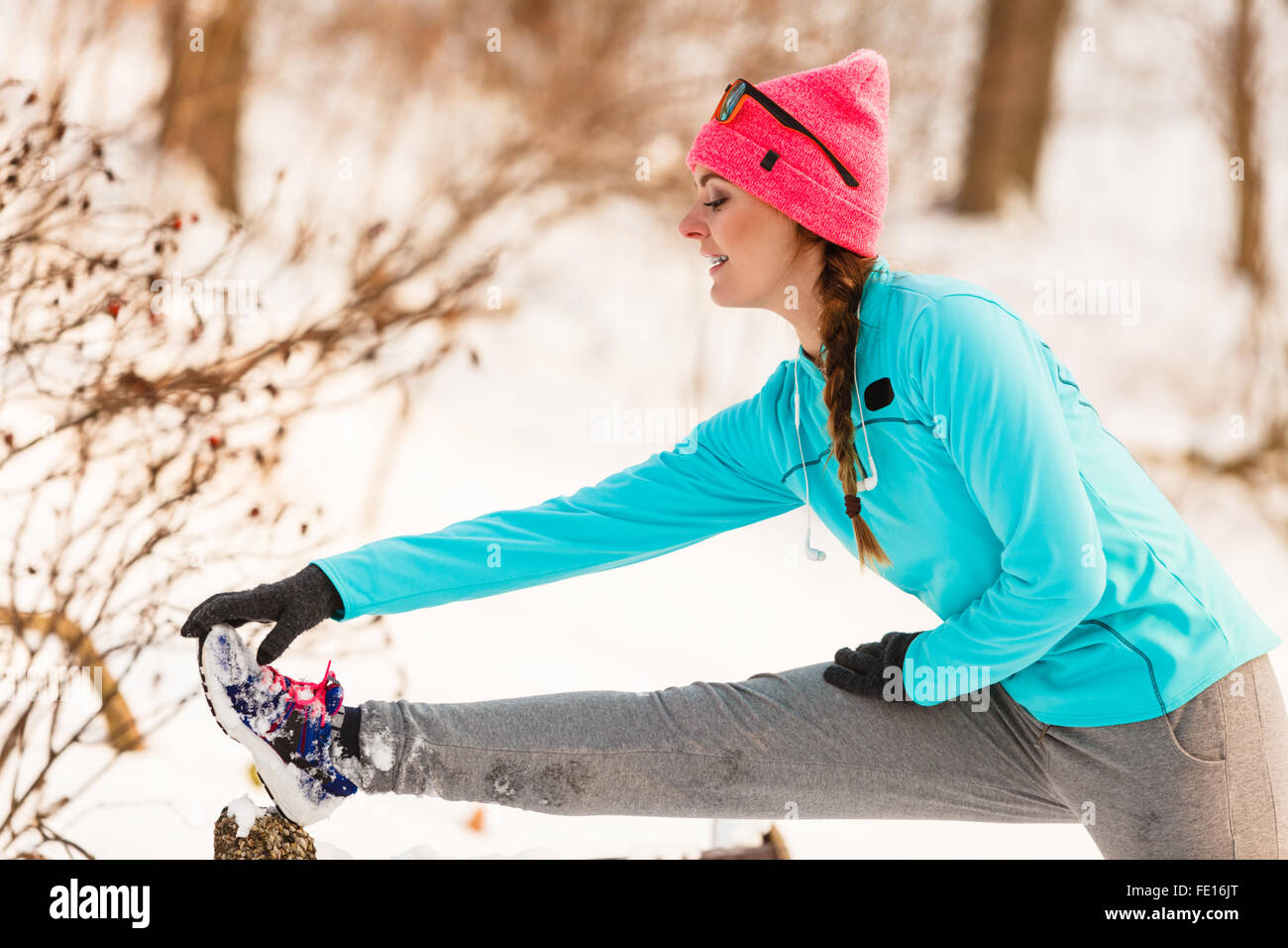 Sports and activities in winter time. Slim fit fitness woman outdoor ...