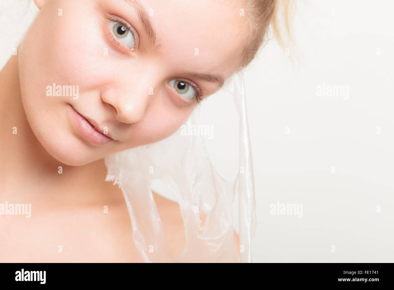 Beauty skin care cosmetics and health concept. Closeup young woman face ...